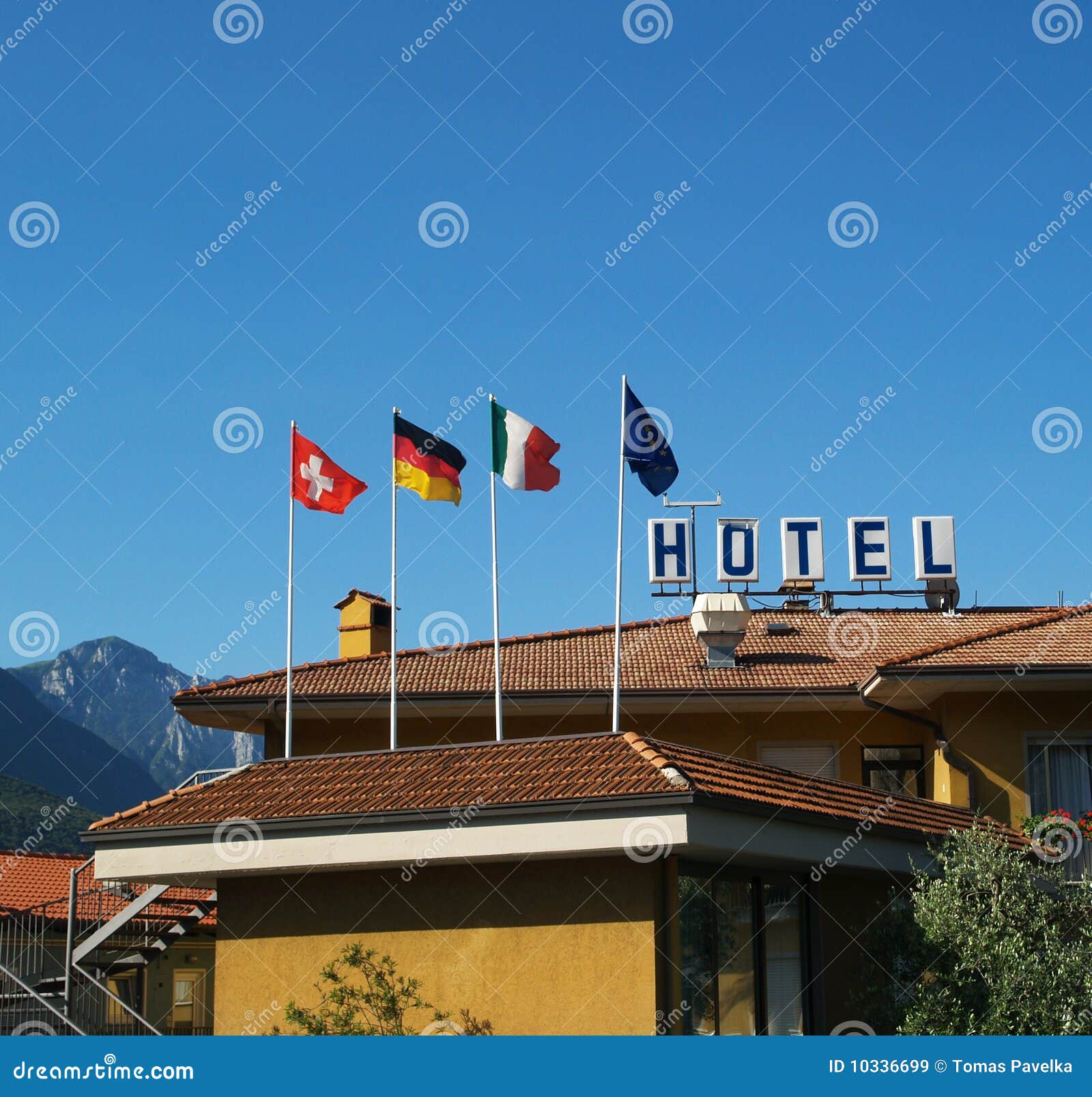 Hotel roof with flags stock image. Image of national - 10336699