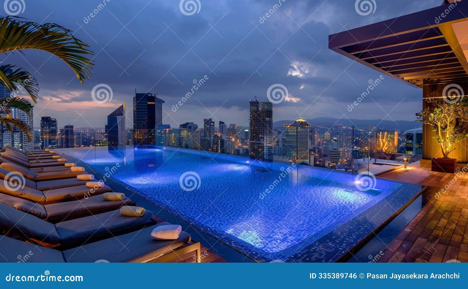 Hotel Rooftop Pool Features Stunning Views and Comfortable Loungers ...