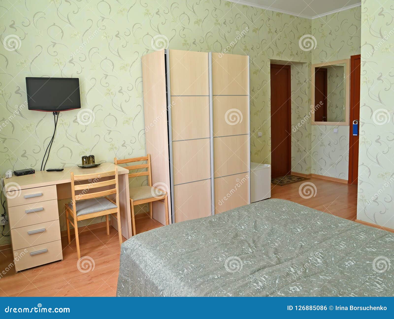 The Hotel Room of Economy Class with a Desk Stock Photo - Image of ...