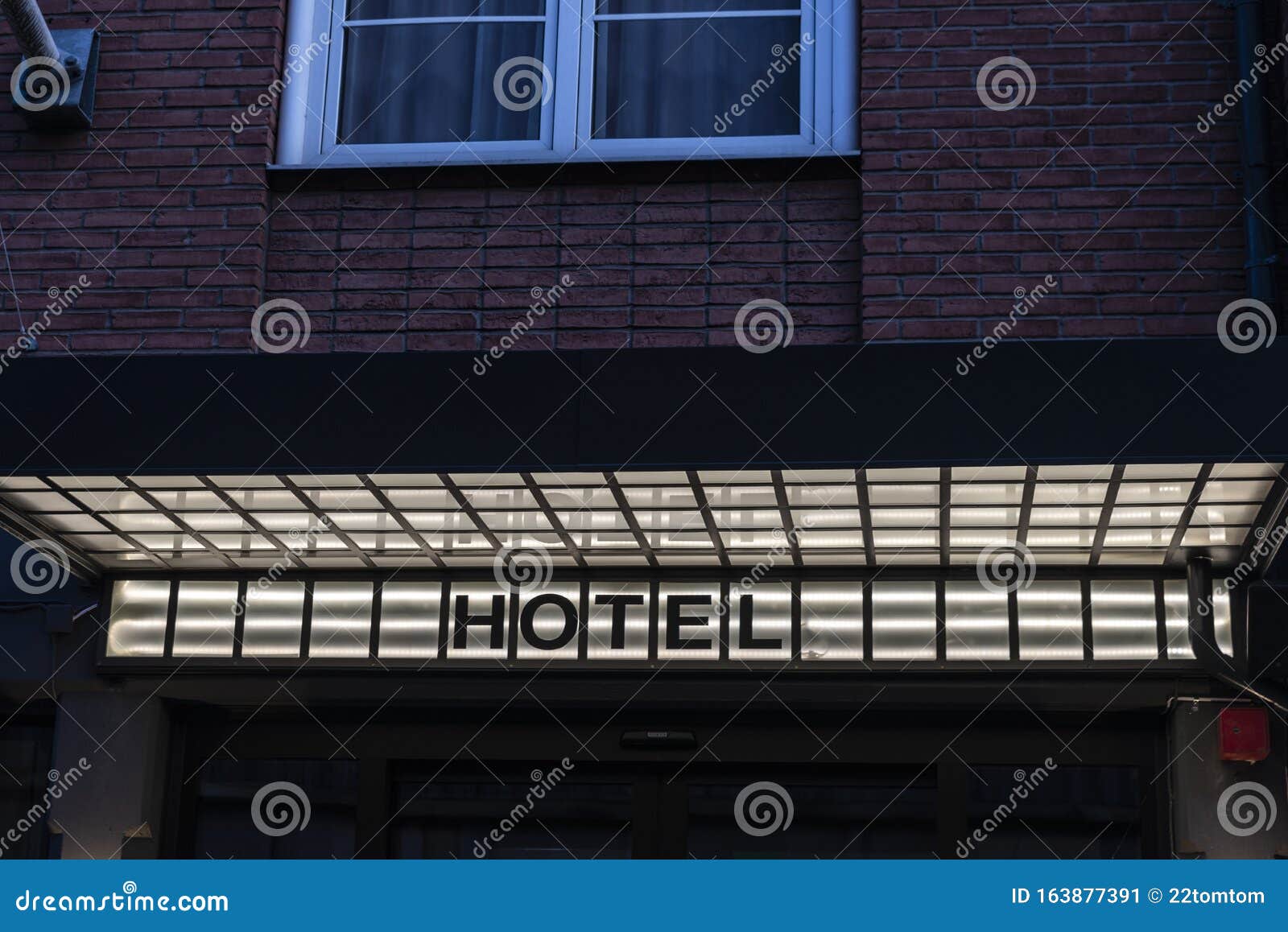 Hotel Sign Illuminated at Night Stock Image - Image of tourism ...