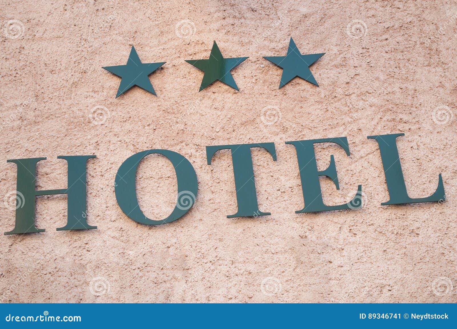 Hotel Signage with Three Stars on Stoned Wall Stock Image - Image of ...