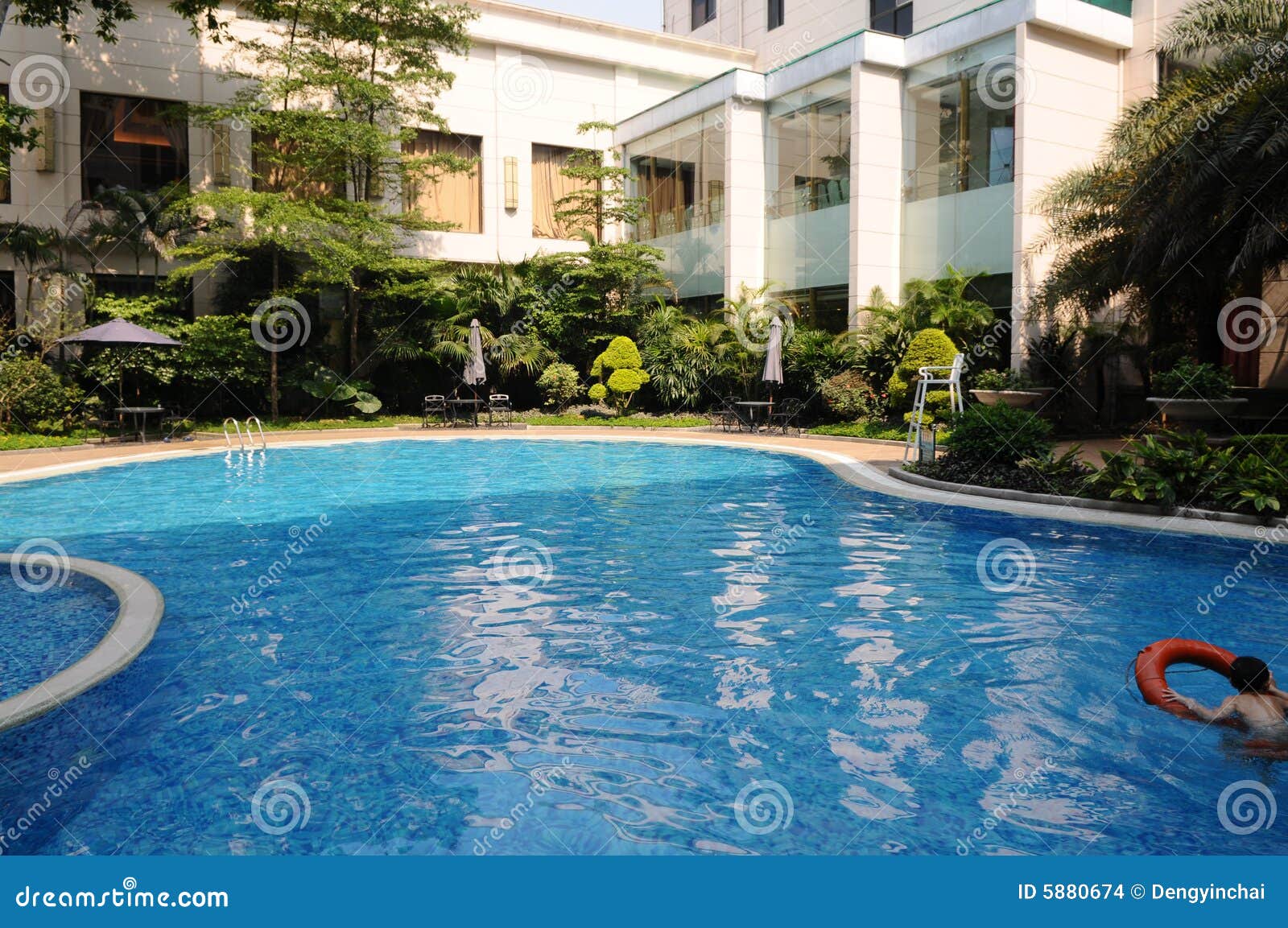 The hotel swimming pool stock photo. Image of building - 5880674