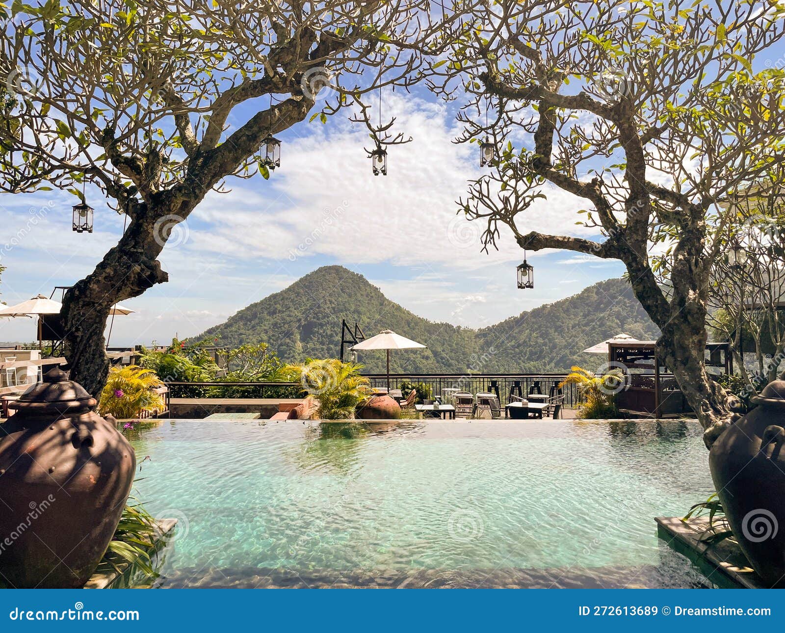 Hotel Swimming Pool with Natural Backdrop of Mountains Stock Image ...