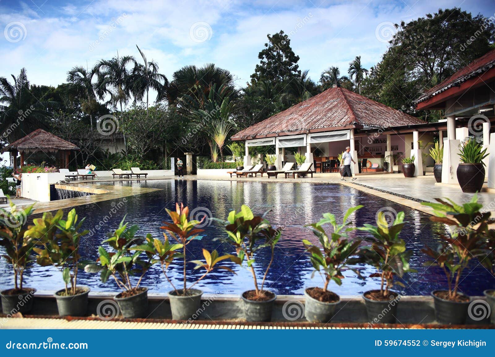 Hotel with swimming pool editorial photography. Image of establishment ...