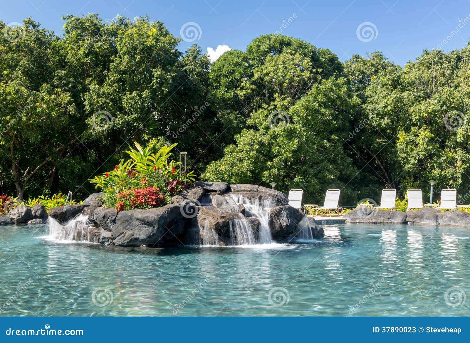 Hotel Swimming Pool with Waterfall Stock Image - Image of rocks ...