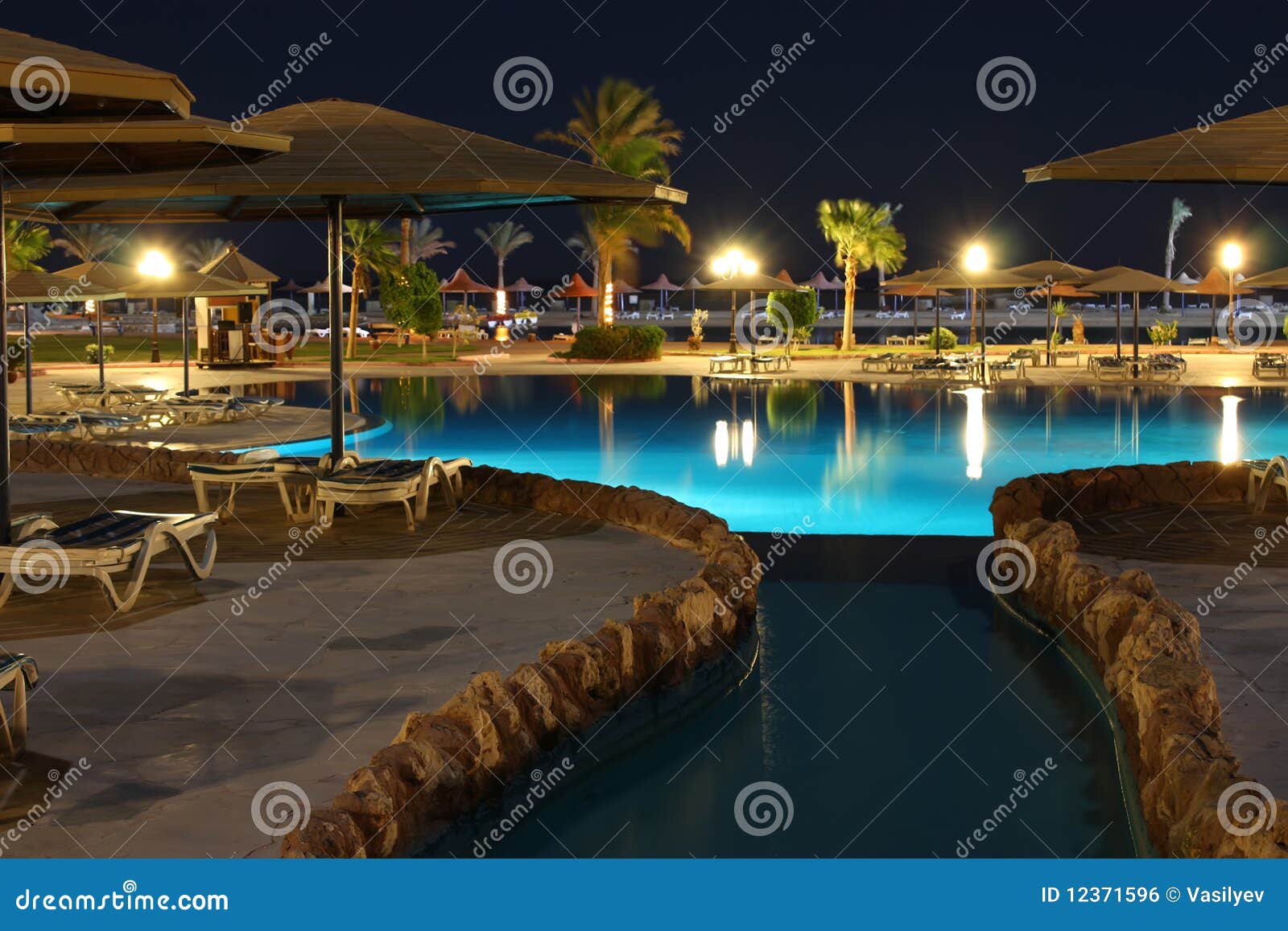 Hotel water pool at night stock photo. Image of vacation - 12371596