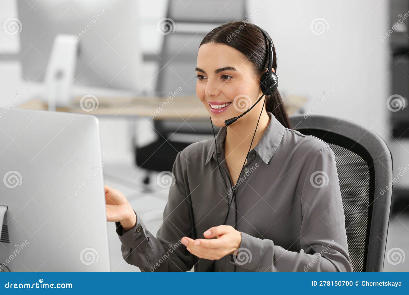 Hotline Operator with Headset Working on Computer in Office Stock Photo ...