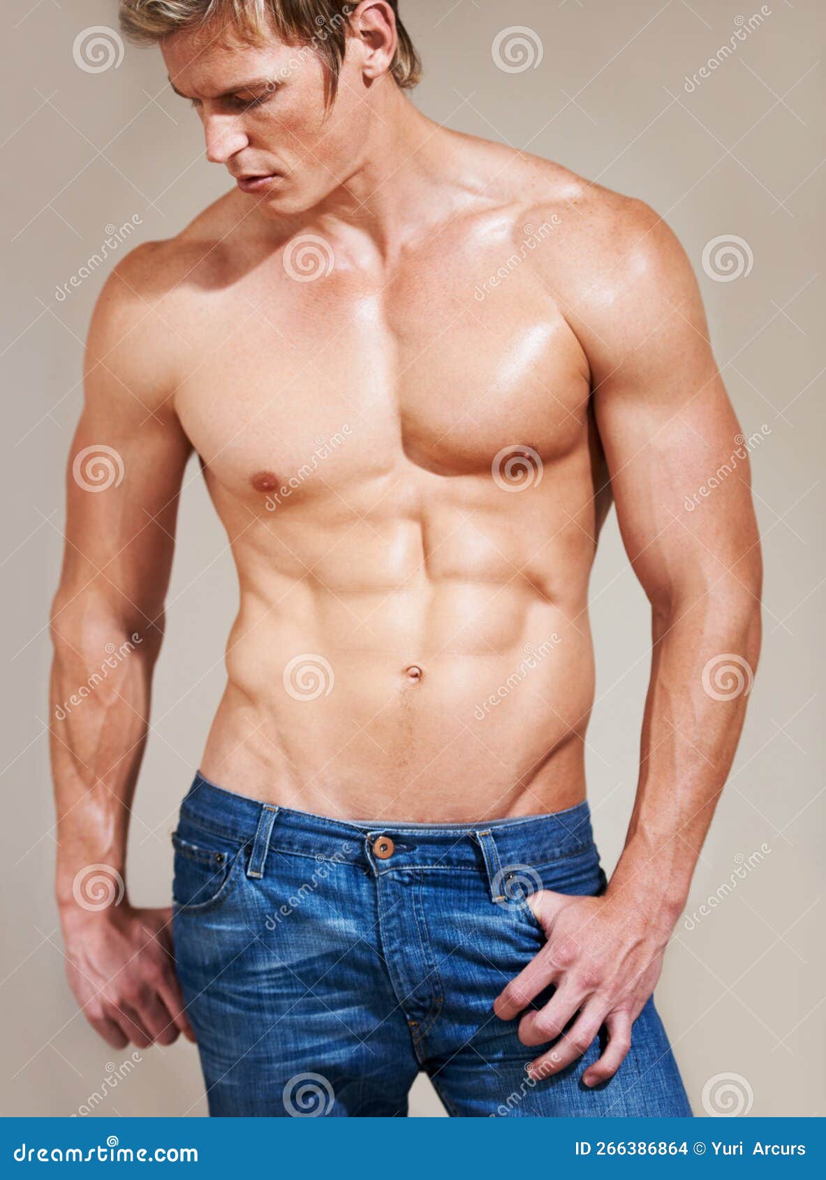 The Hottest Hunk. a Muscular Young Man Posing in Studio. Stock Photo ...
