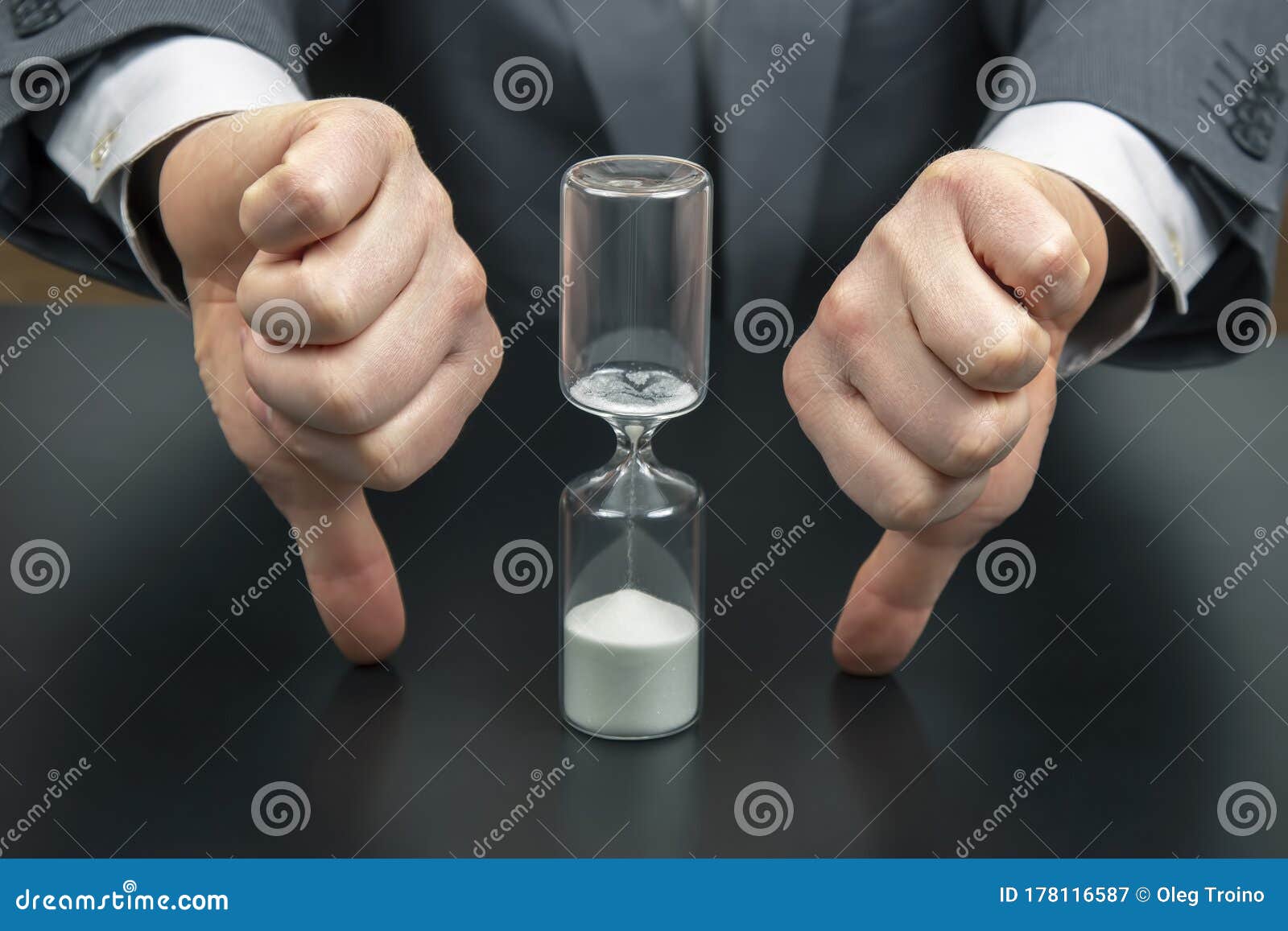 Hourglass on the Background of a Business Man. Distribution of Time for ...
