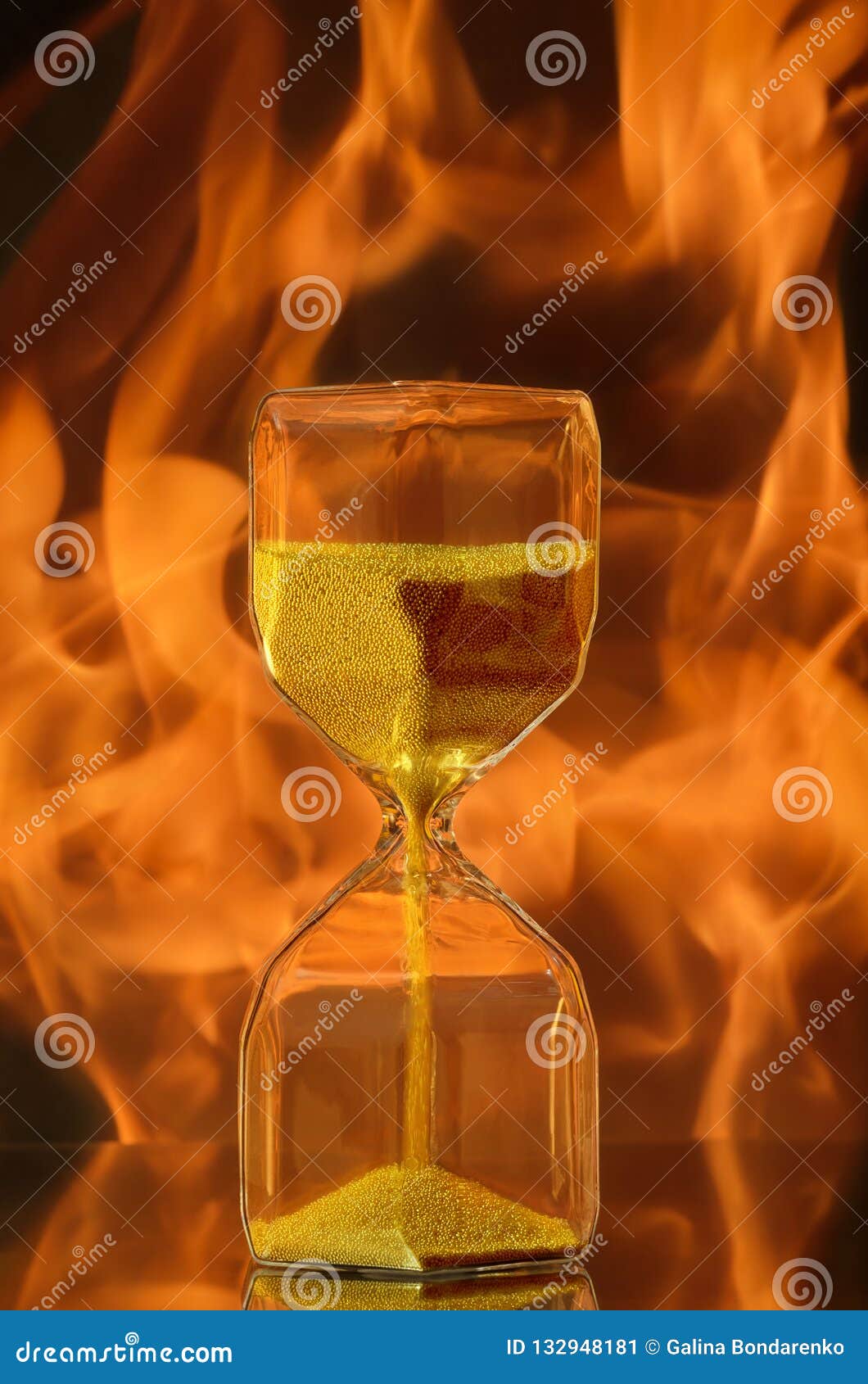 Hourglass on the Background of the Raging Flame Stock Image - Image of ...