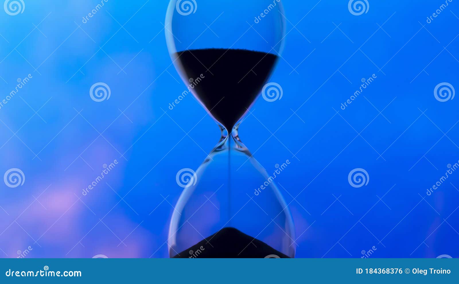 Hourglass on the Blue Background. the Value of Time in Life Stock Photo ...