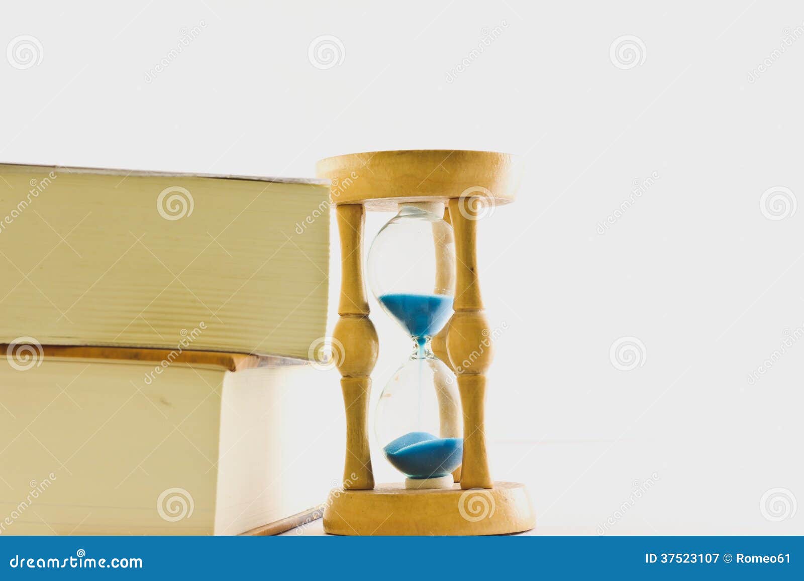 Hourglass with book stock image. Image of sand, lifestyle - 37523107