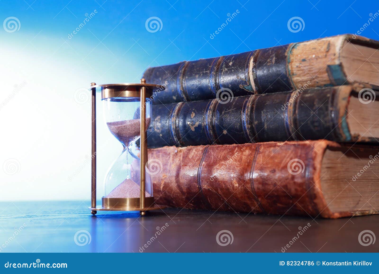 Hourglass and Books stock photo. Image of creation, background - 82324786