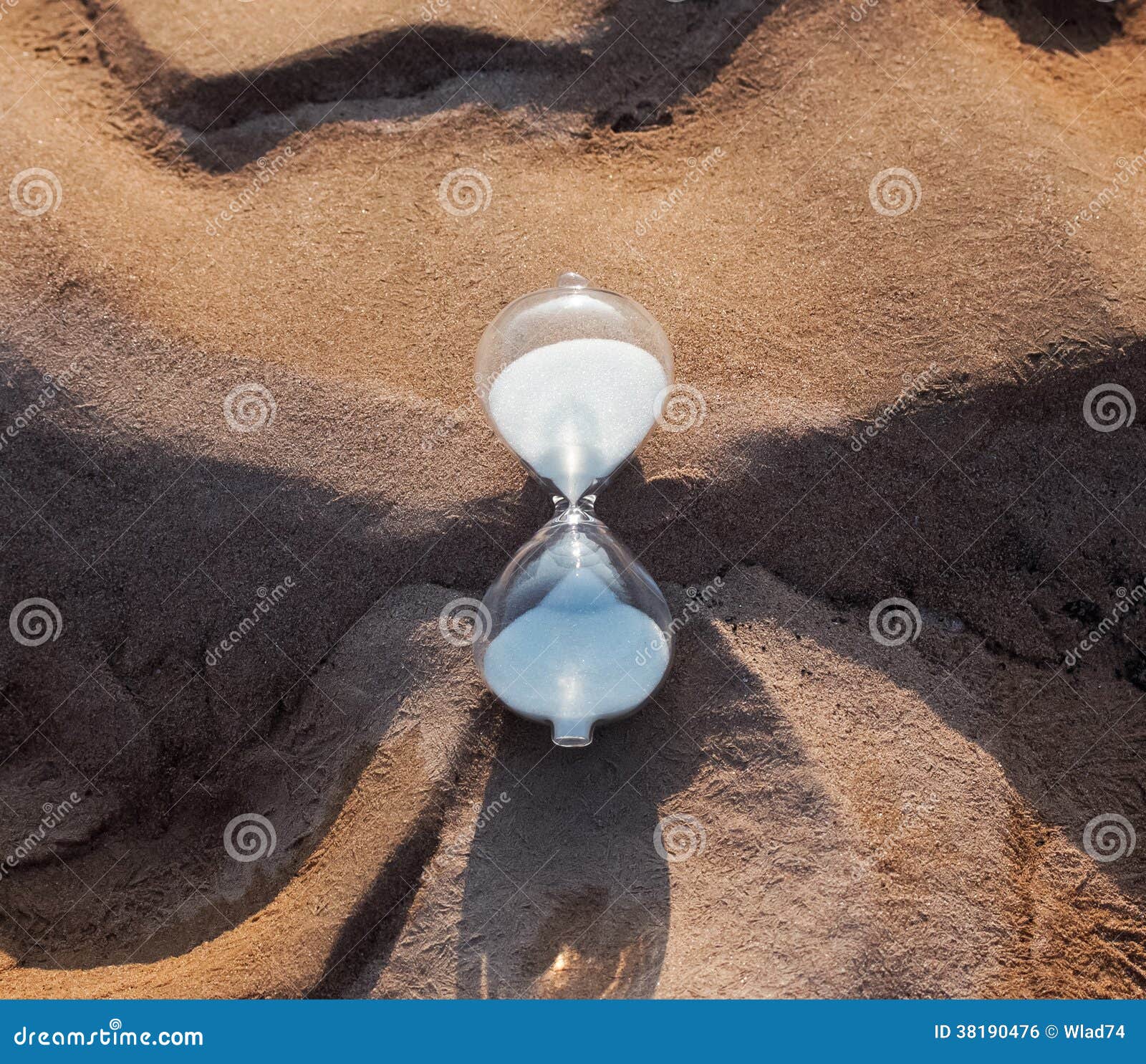 Hourglass on the Frozen Sand Stock Photo - Image of hour, ripple: 38190476