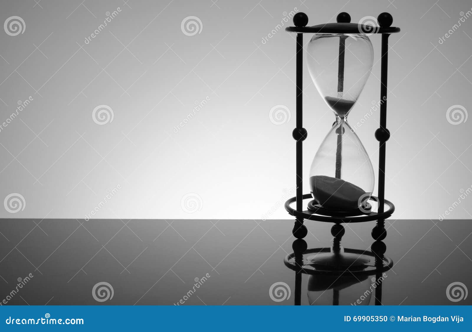 Hourglass on a Gray Gradient Background Stock Photo - Image of gray ...