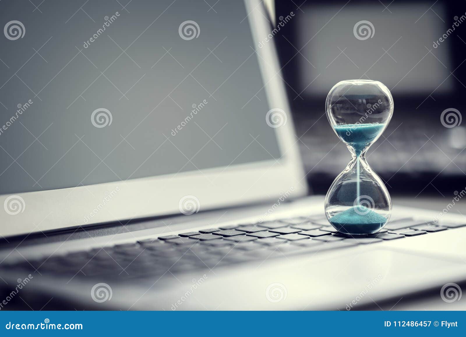 Hourglass on Laptop Computer Concept for Time Management Stock Image ...
