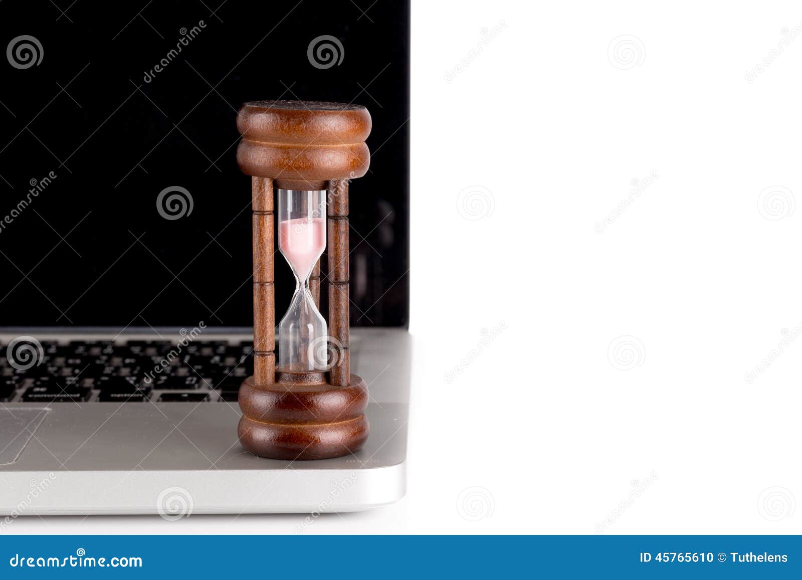 Hourglass with laptop stock photo. Image of businessperson - 45765610