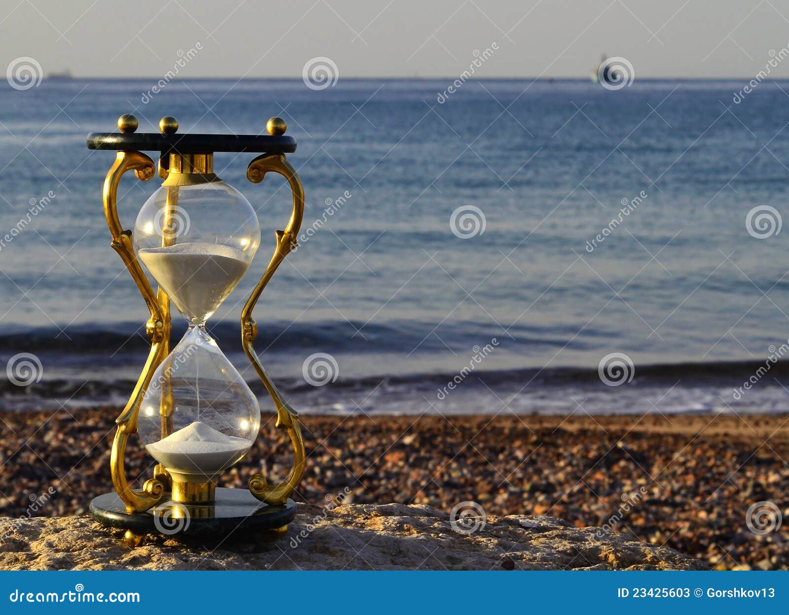 Hourglass on marine beach stock image. Image of awaiting - 23425603