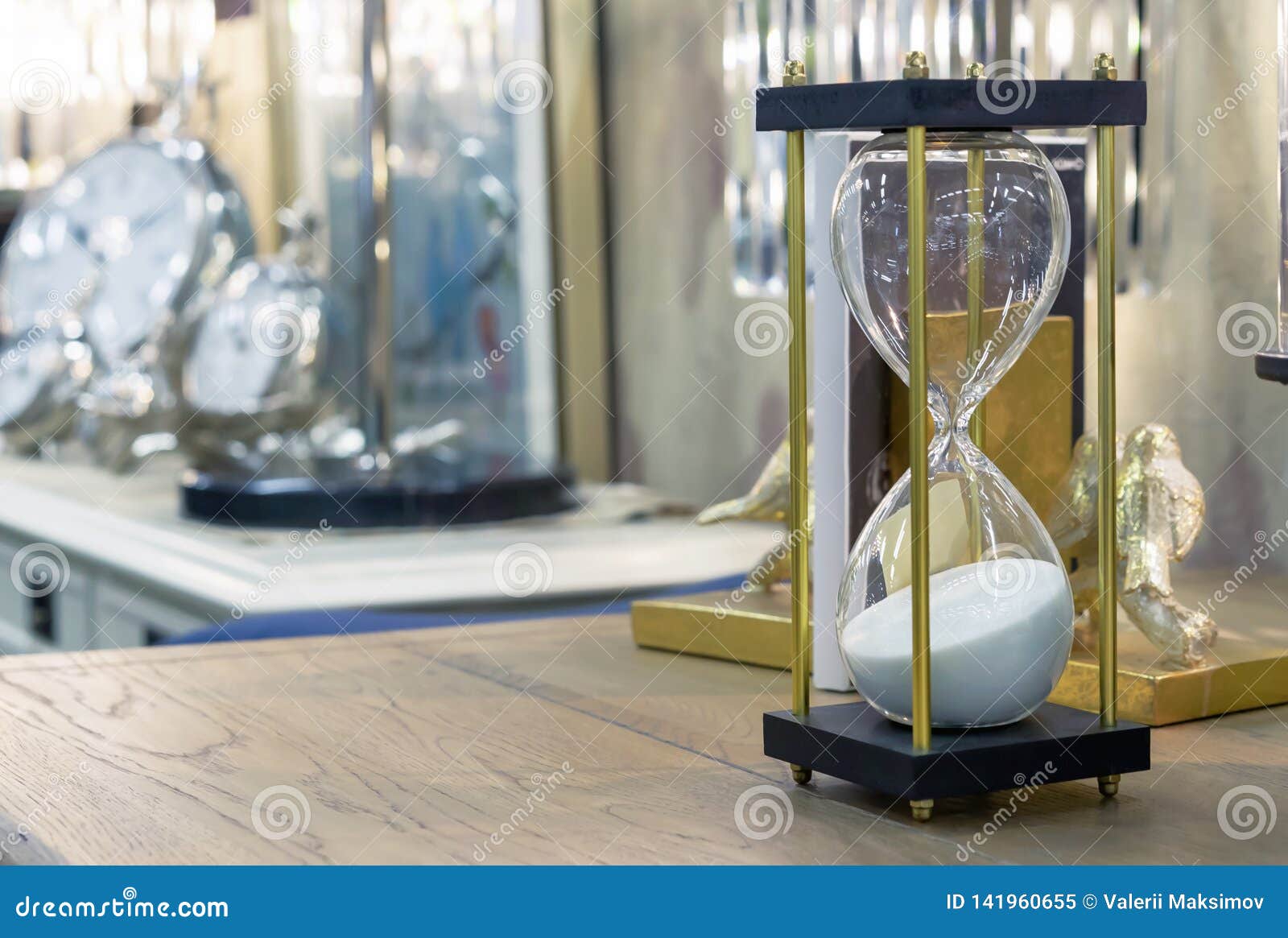 Hourglass in Modern Style on a Wooden Table Stock Image - Image of ...