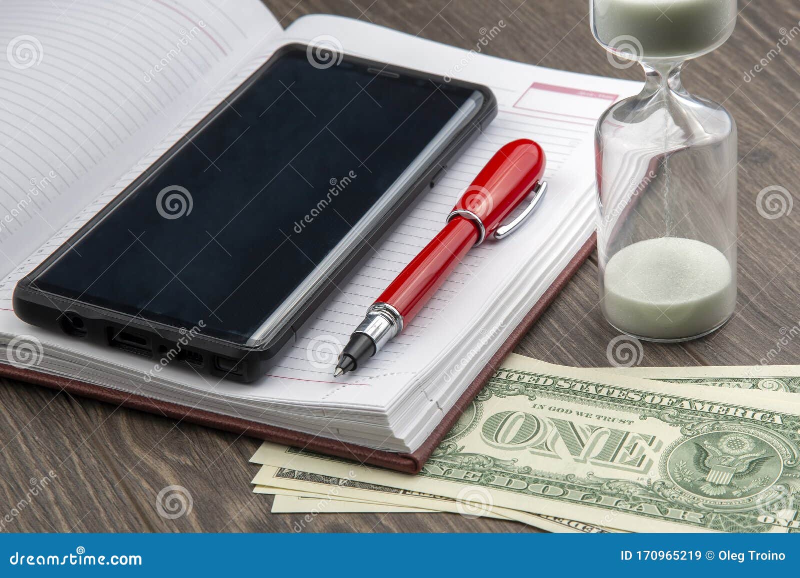 Hourglass, Money, Pen and Notebook are on the Table. Business Office ...
