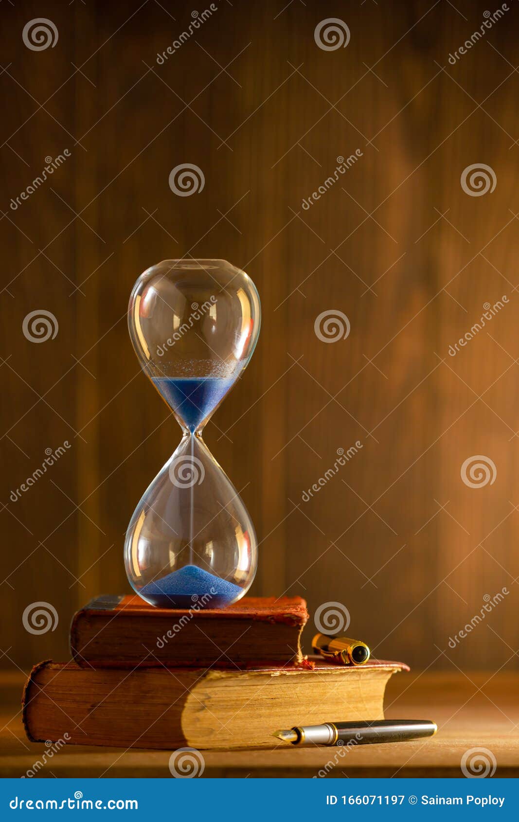 Hourglass on Old Book in Morning Light. Stock Image - Image of cover ...
