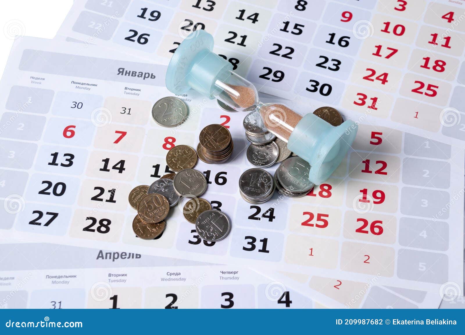 Hourglass and Rubles Scattered on Calendar Sheets Stock Photo - Image ...