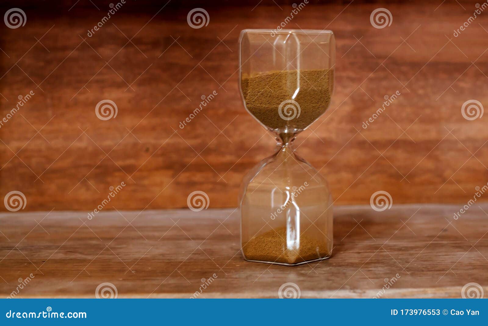 An Hourglass with Sand Falling through. Old Age, Nostalgia Concept ...