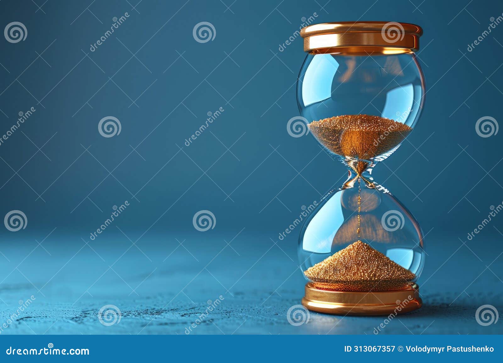 An Hourglass with Sand Inside on a Blue Background Stock Image - Image ...
