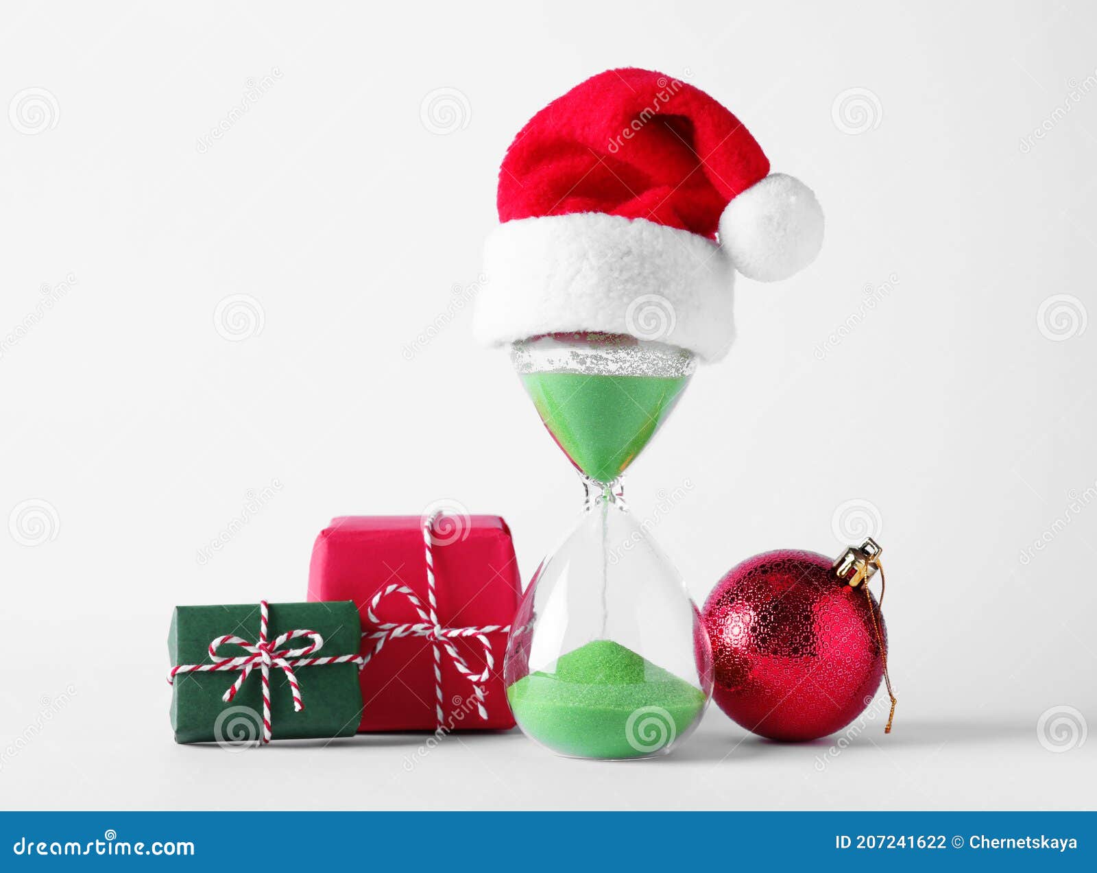 Hourglass And Santa Hat Isolated On White. Christmas Countdown Stock ...
