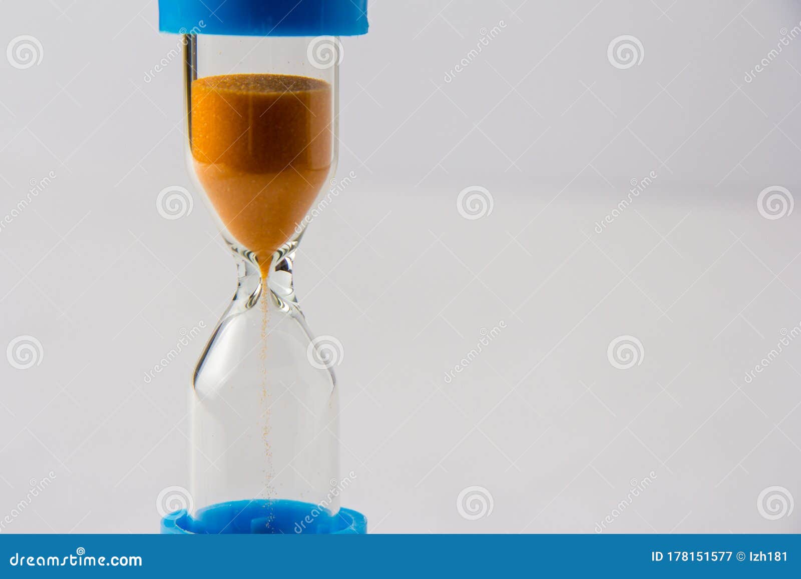 Hourglass Shows Time in the Background with Medical Mask Stock Image ...