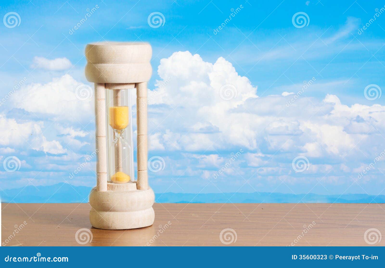 Hourglass with Sky Background Stock Image - Image of watch, clock: 35600323