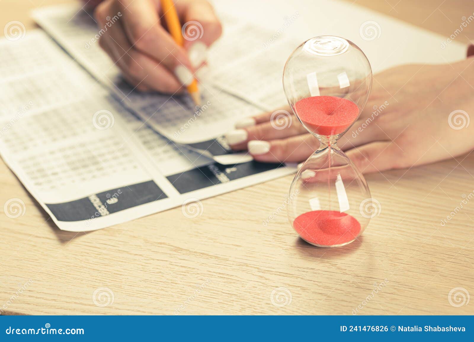 Hourglass with Time Running Out and Student Hand Testing in Exercise ...
