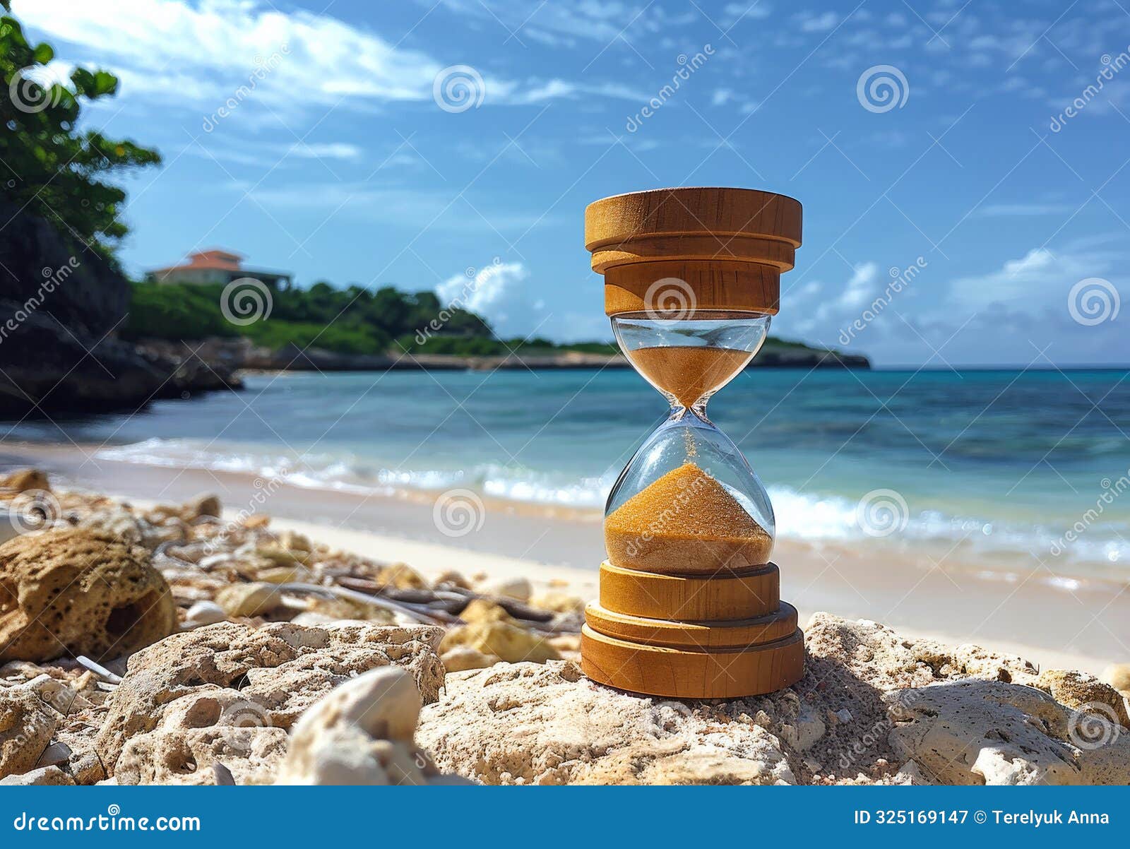 Hourglass on a Tropical Beach. an Hourglass Sits on a Sandy Beach, with ...