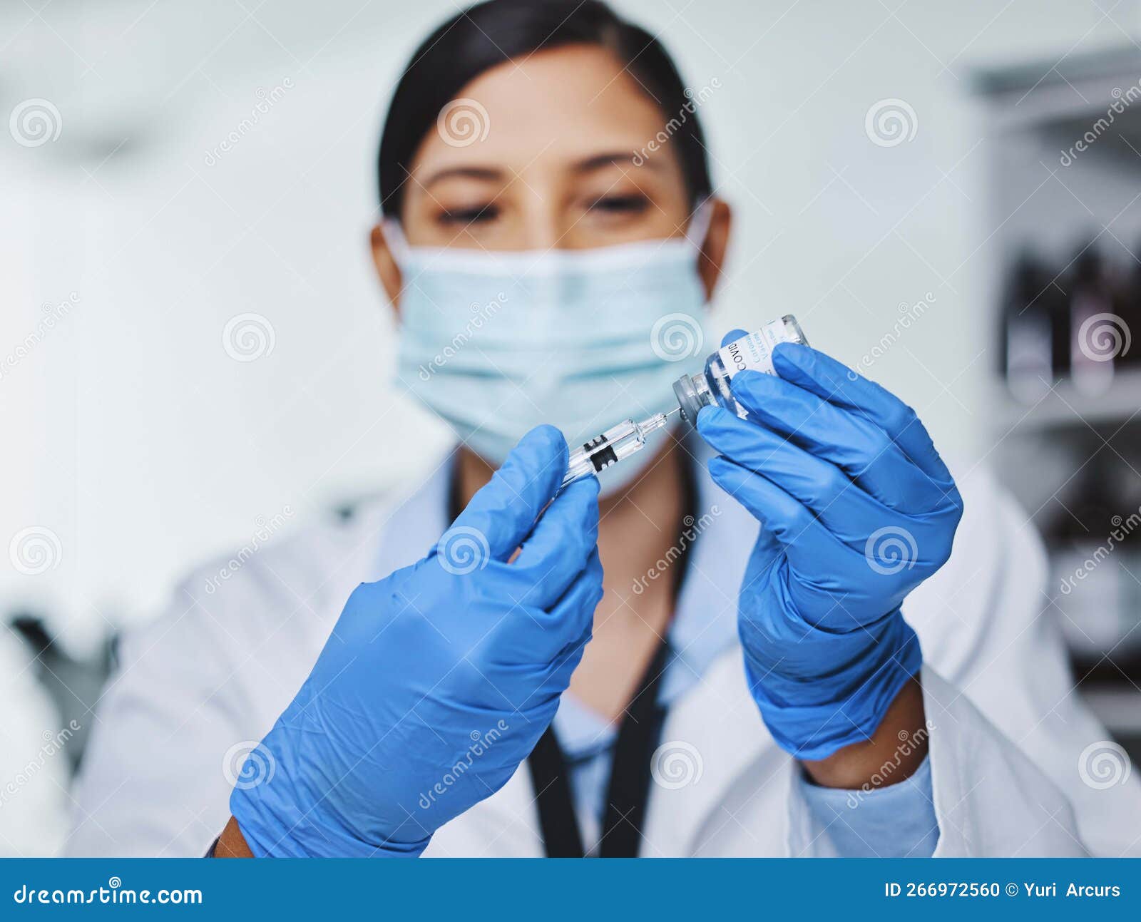 Hours of Hard Work in a Tiny Tube. a Young Female Researcher Working in ...