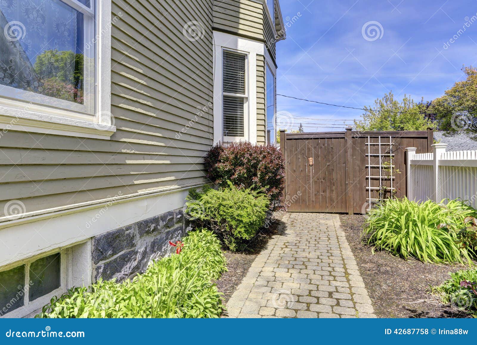 Top View Of Walkway In The Garden And Green Shrub Beside Pathway ...