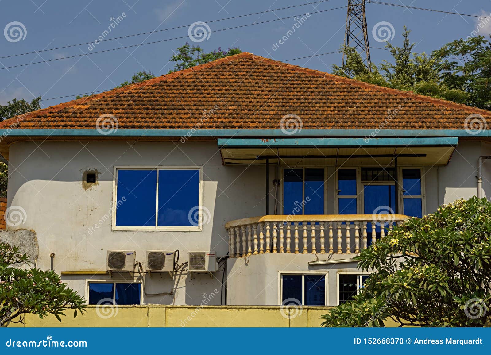 A house with blue windows stock photo. Image of travel - 152668370
