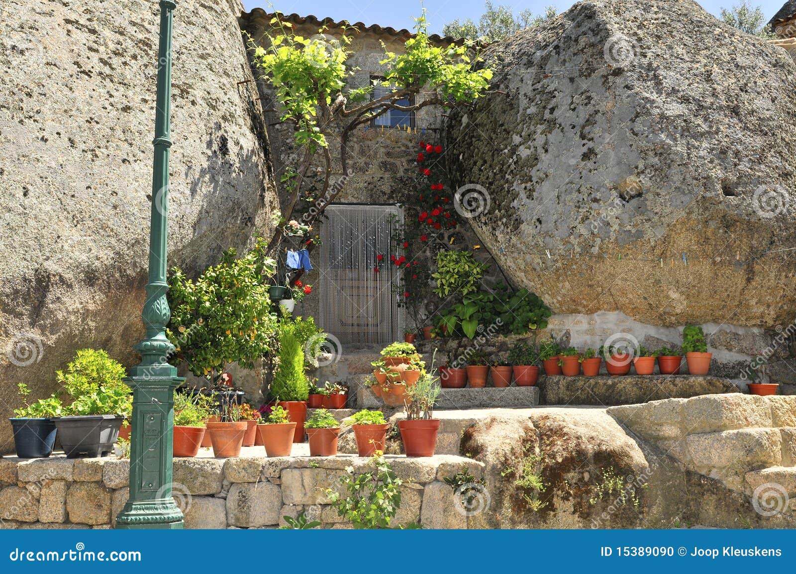 House build between rocks stock photo. Image of construct - 15389090