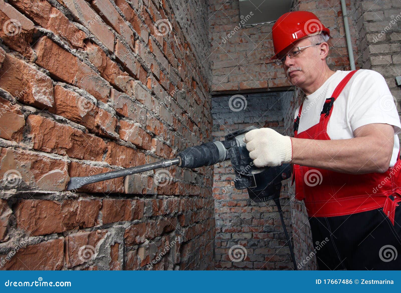 House-builder in Uniform Working with a Plugger Stock Photo - Image of ...
