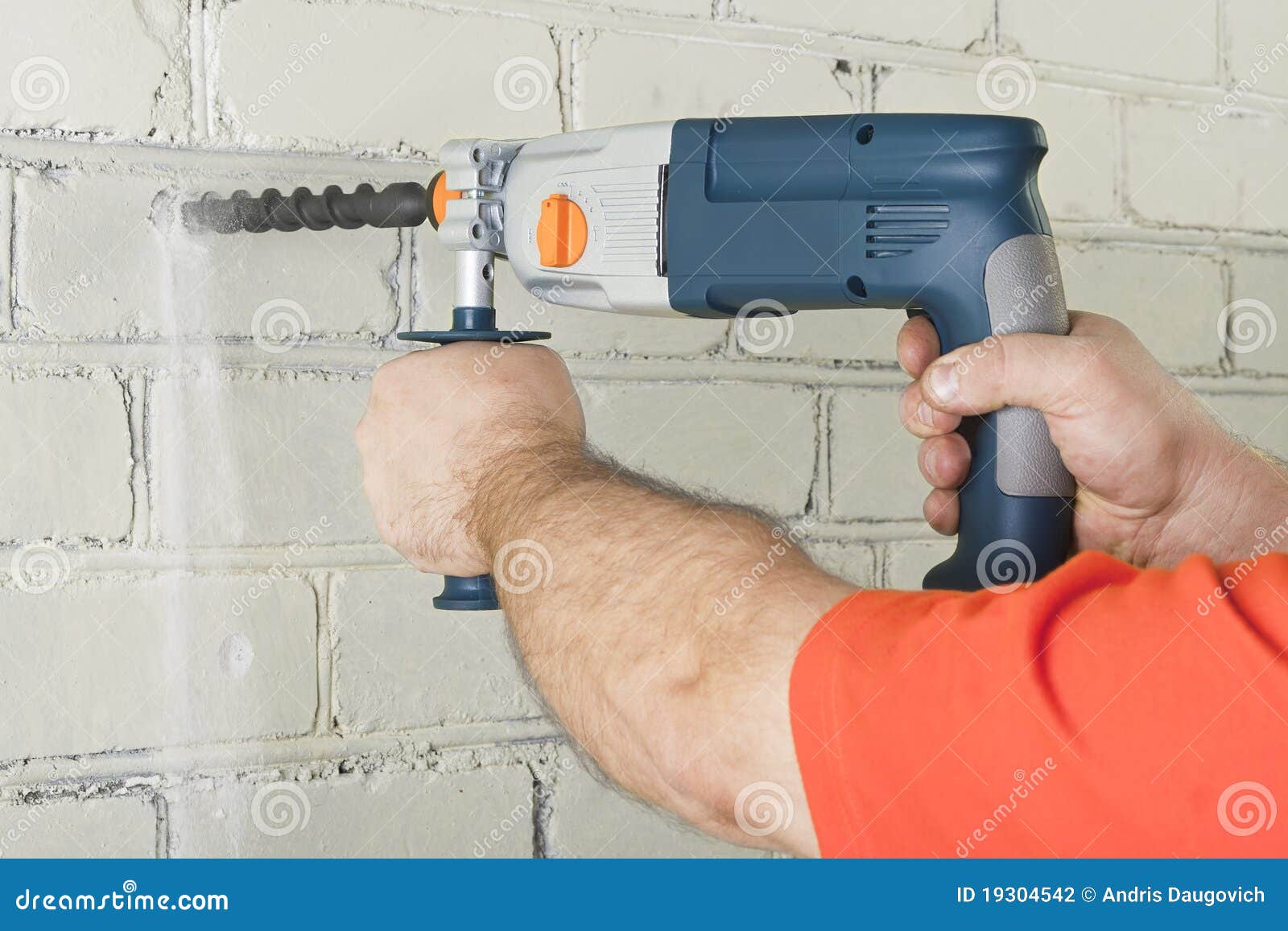 House-builder Working with a Perforator Stock Photo - Image of building ...