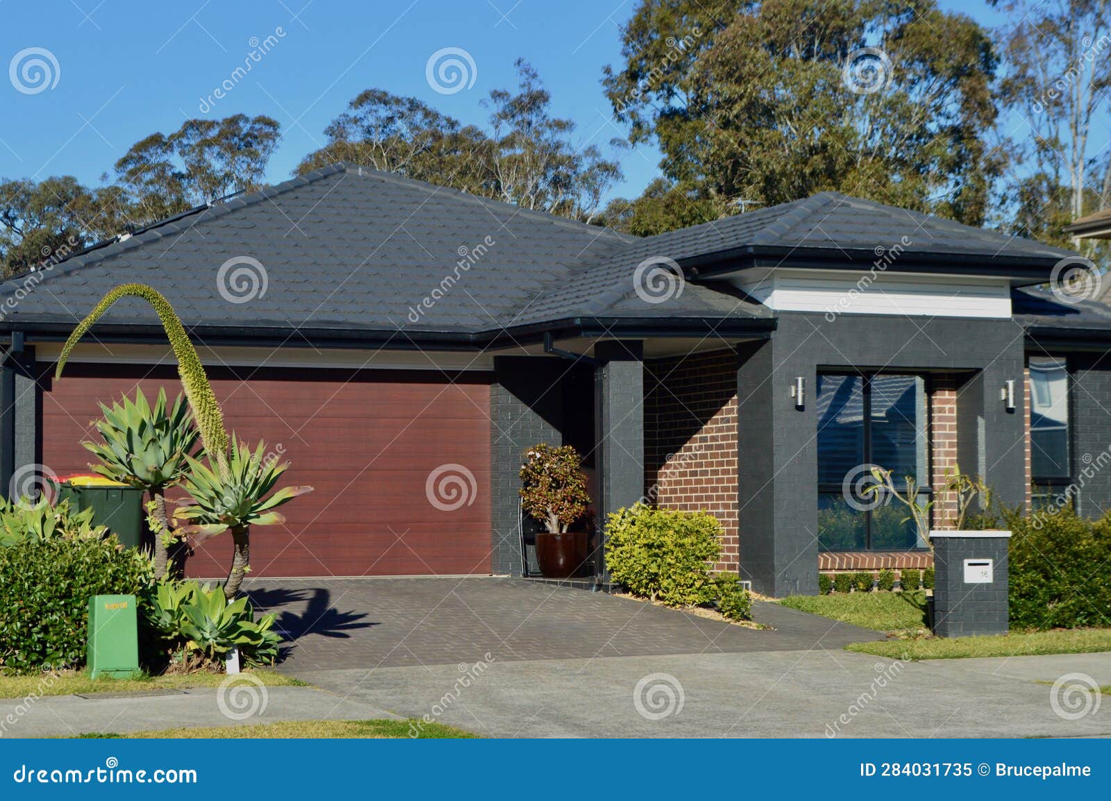 A House with Bushes in Front of a Building Editorial Image - Image of ...