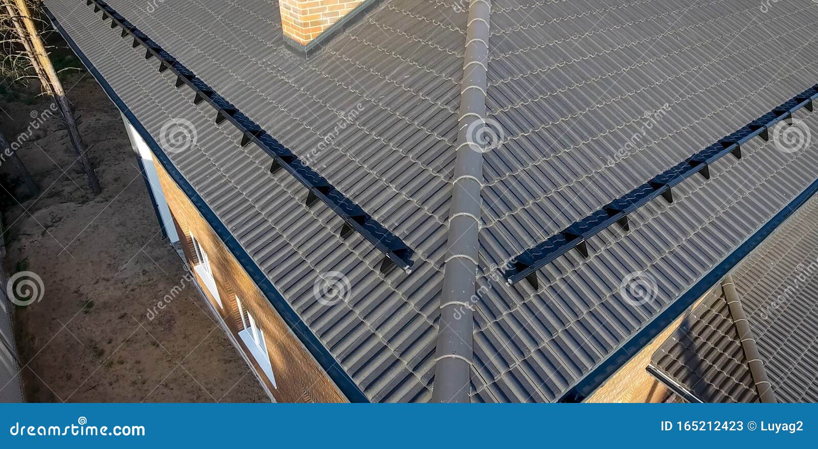 House with Ceramic Tile Roof. Cement-sand Roof Tiles Stock Image ...