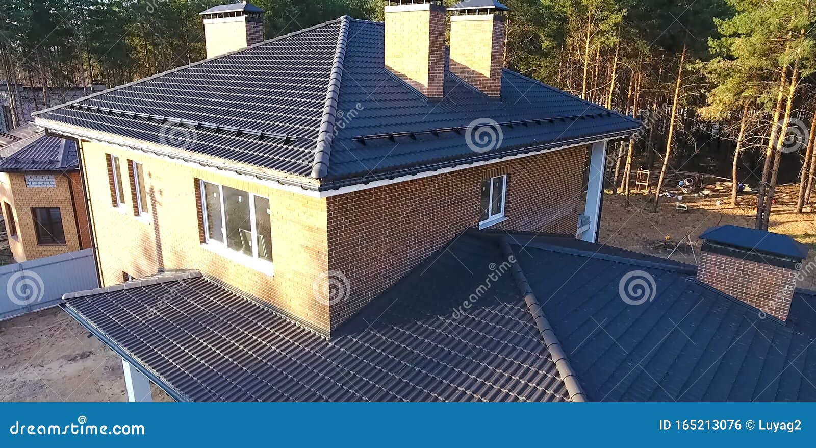 House with Ceramic Tile Roof. Cement-sand Roof Tiles Stock Photo ...