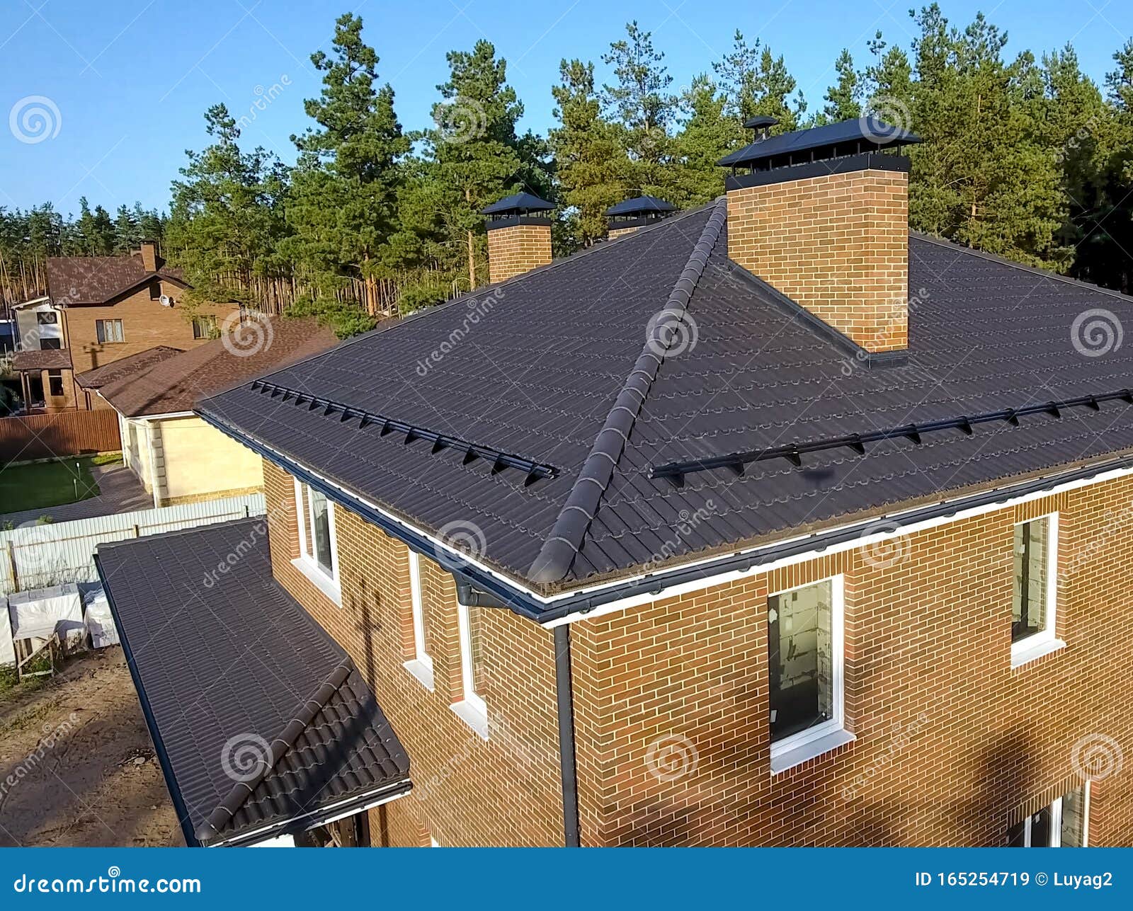 House with Ceramic Tile Roof. Cement-sand Roof Tiles Stock Image ...