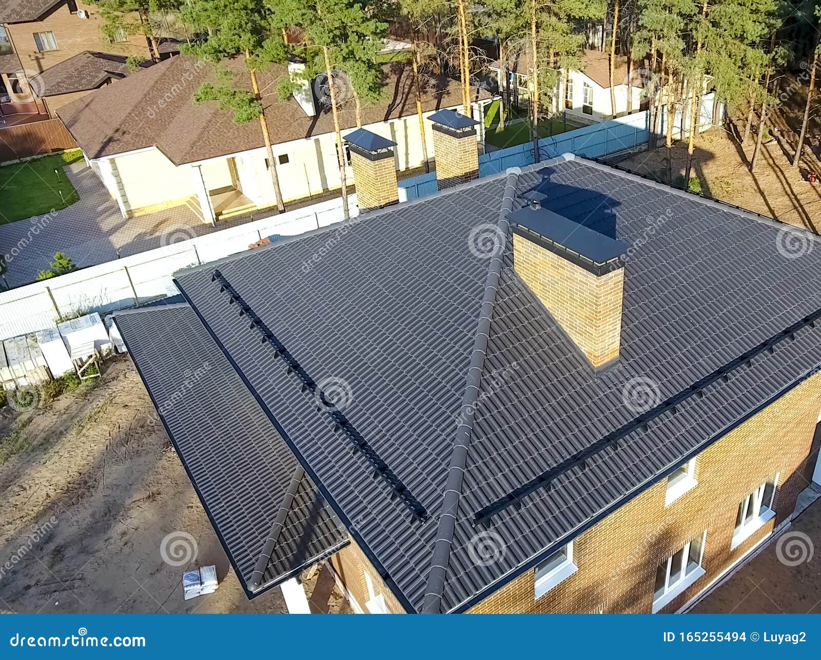 House with Ceramic Tile Roof. Cement-sand Roof Tiles Stock Photo ...