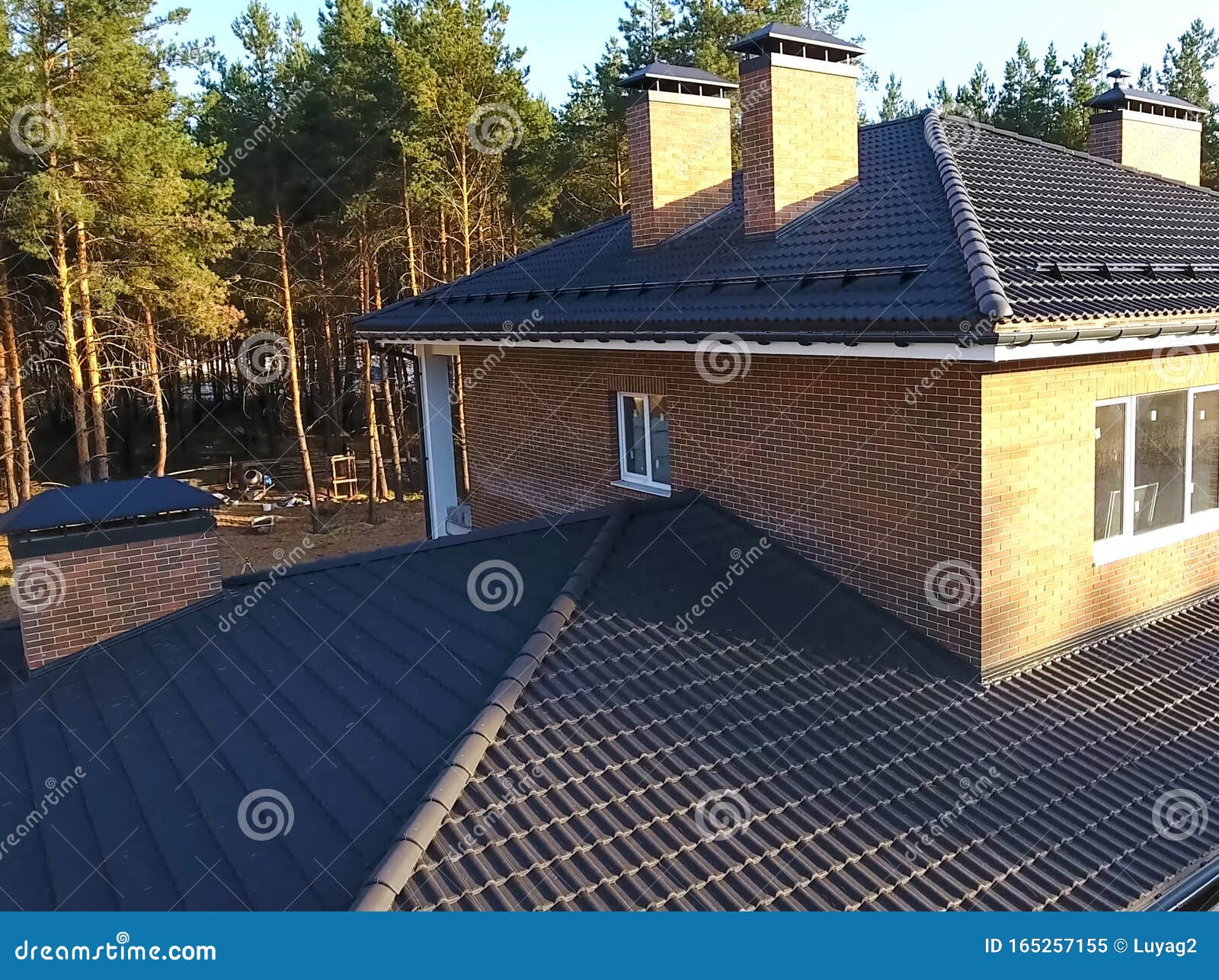 House with Ceramic Tile Roof. Cement-sand Roof Tiles Stock Image ...