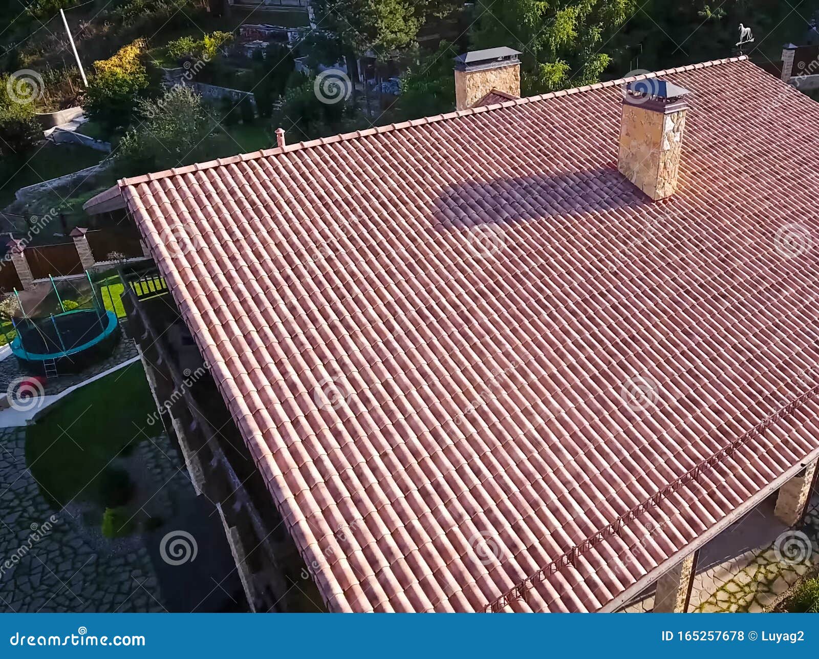 House with Ceramic Tile Roof. Cement-sand Roof Tiles Stock Photo ...