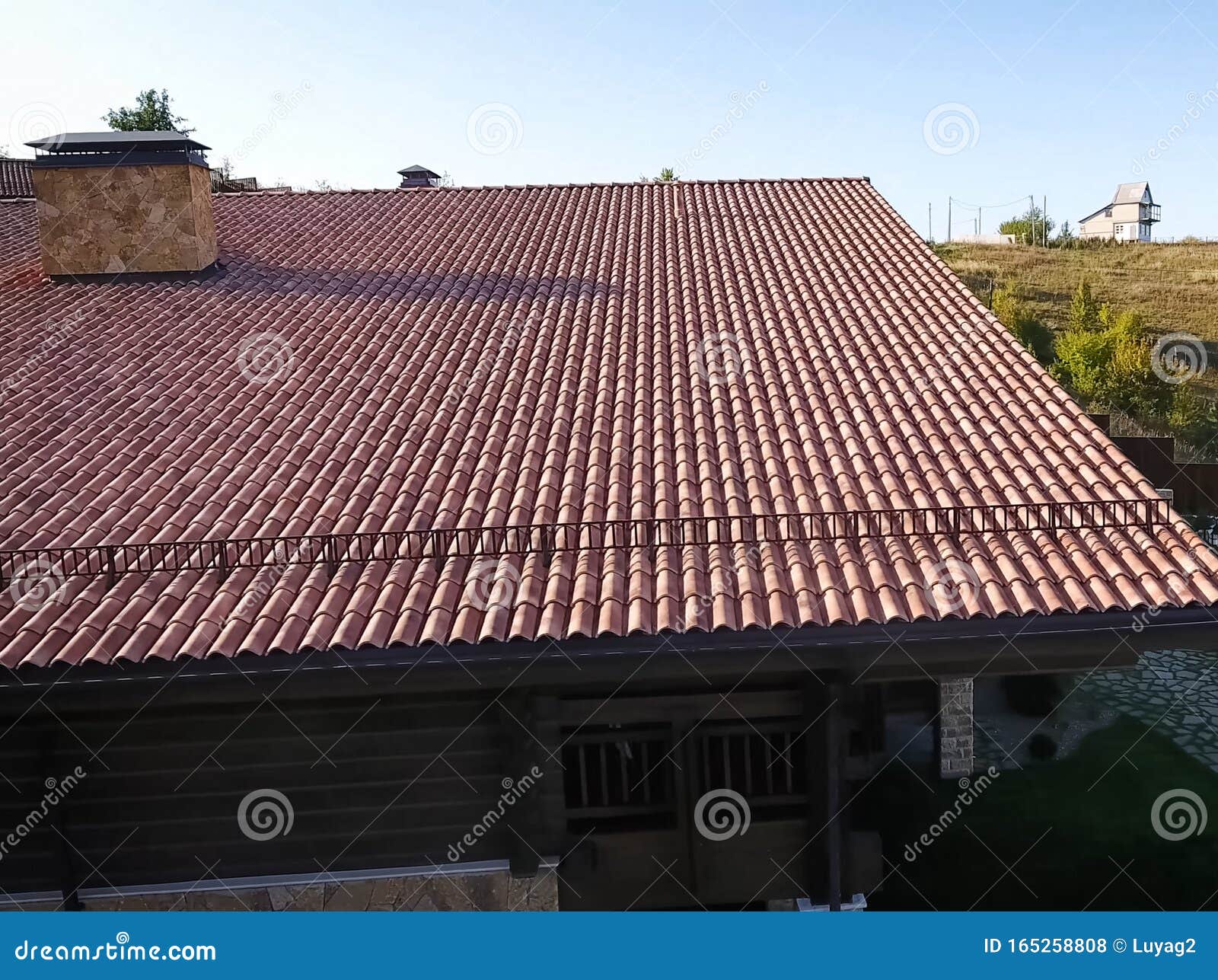House with Ceramic Tile Roof. Cement-sand Roof Tiles Stock Photo ...
