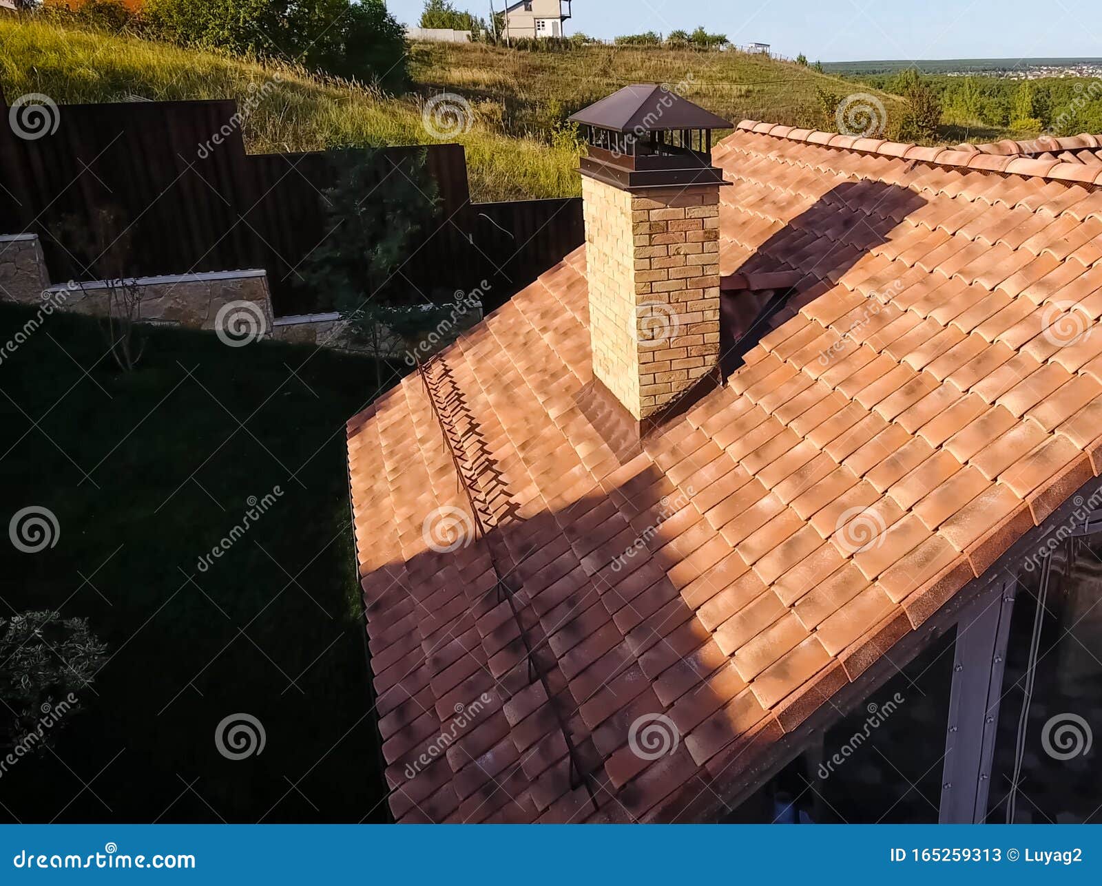 House with Ceramic Tile Roof. Cement-sand Roof Tiles Stock Image ...