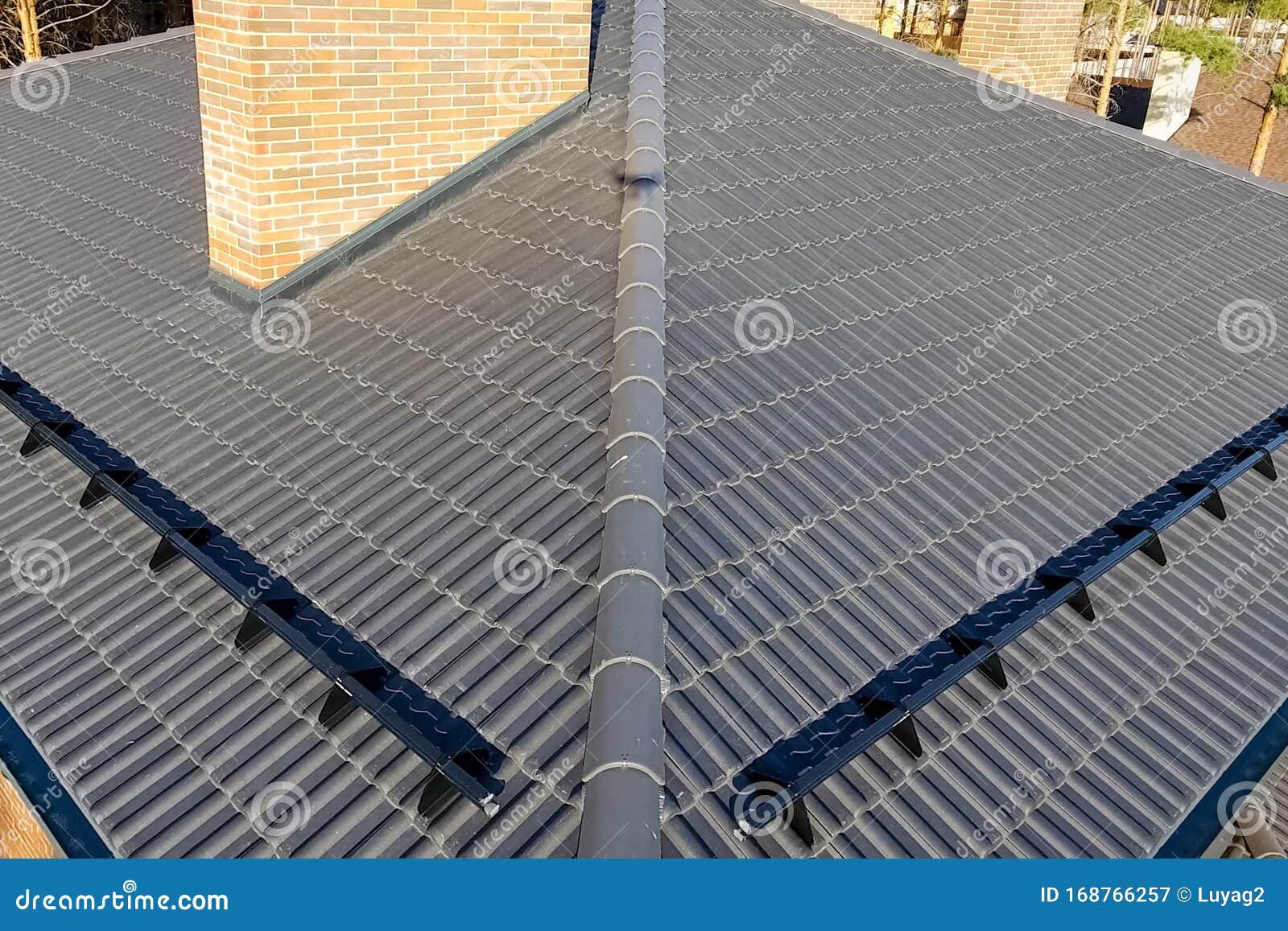 House with Ceramic Tile Roof. Cement-sand Roof Tiles Stock Image ...