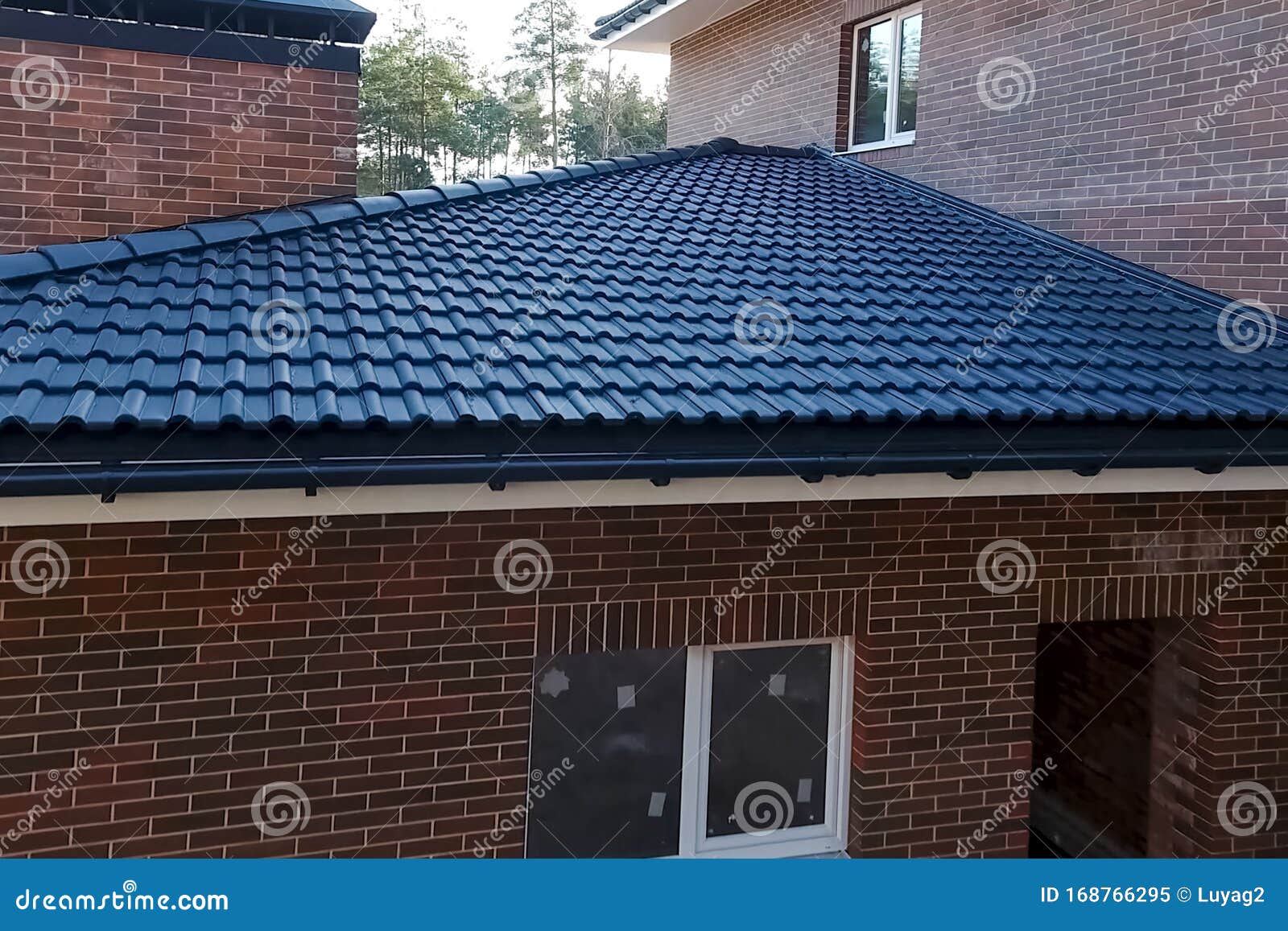 House with Ceramic Tile Roof. Cement-sand Roof Tiles Stock Image ...